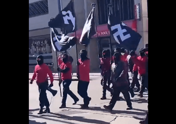 Neo-Nazis with swastika flags hold ‘disgusting and repugnant’ march in ...